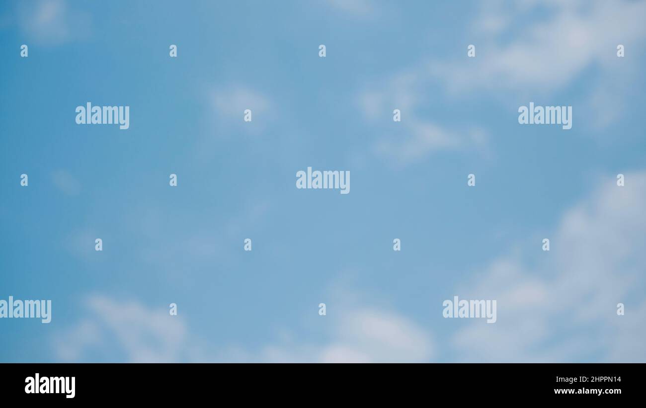 Blue Sky with Light Clouds Backdrop Stock Photo - Alamy