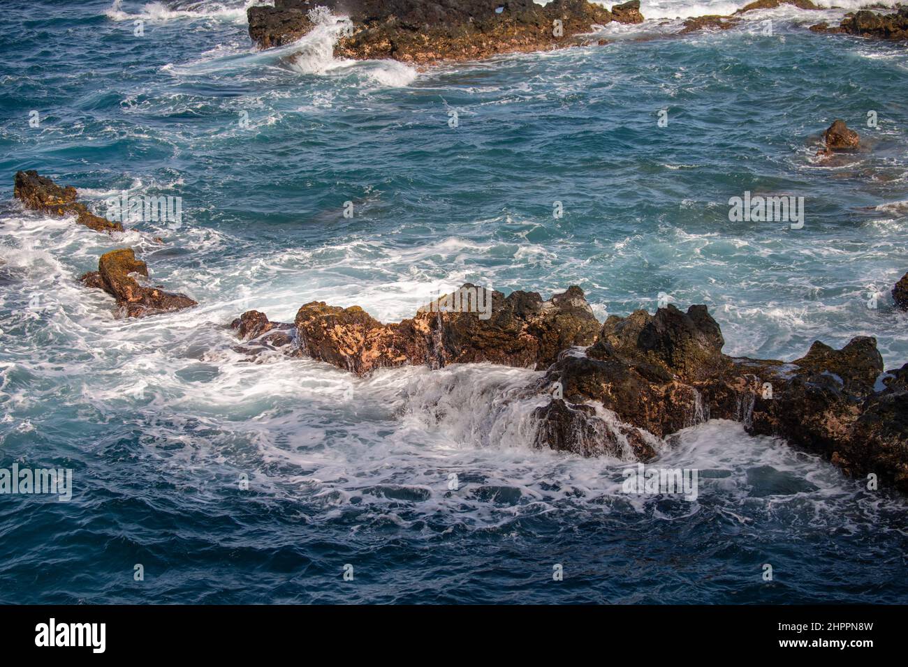Sea stone beach, sea waves. Colorful blue sea background. The concept ...
