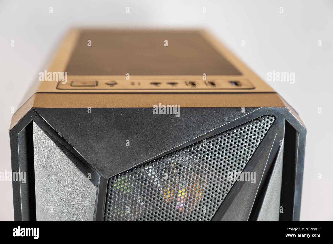 The front of a modern desktop computer. Black system unit in a ...