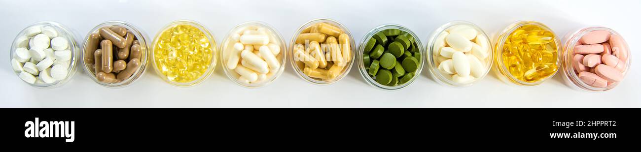 Supplements and vitamins on a white background. Selective focus Stock ...