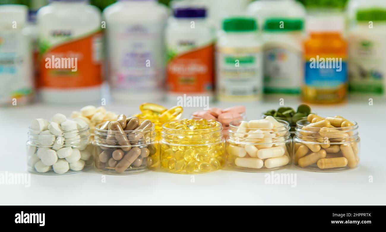 Supplements and vitamins on a white background. Selective focus Stock ...