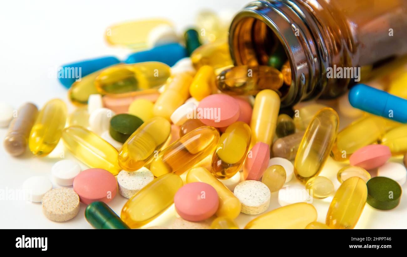 Supplements and vitamins on a white background. Selective focus Stock ...