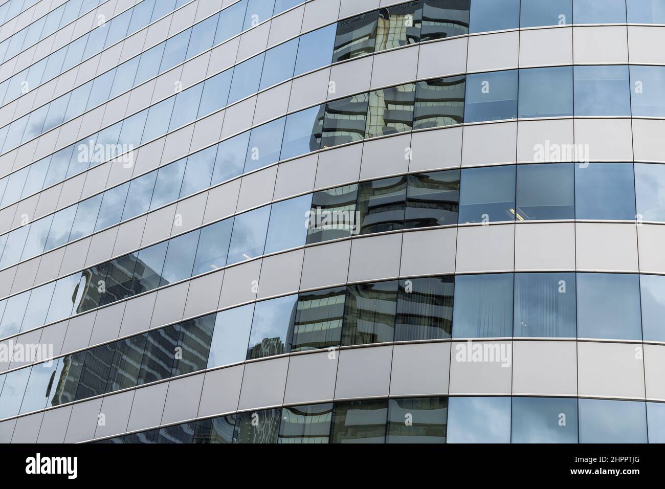 Blue glass office building background Stock Photo - Alamy