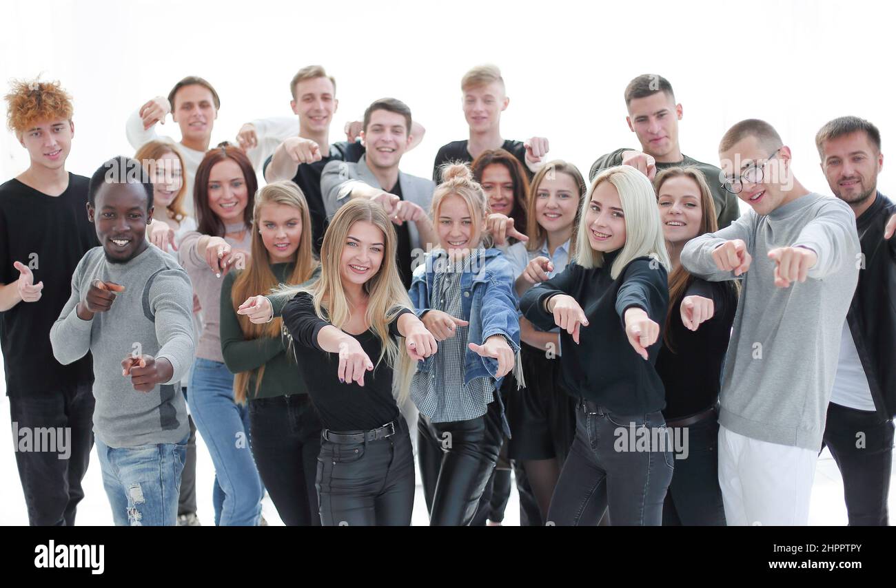 close up. smiling young people looking up Stock Photo - Alamy