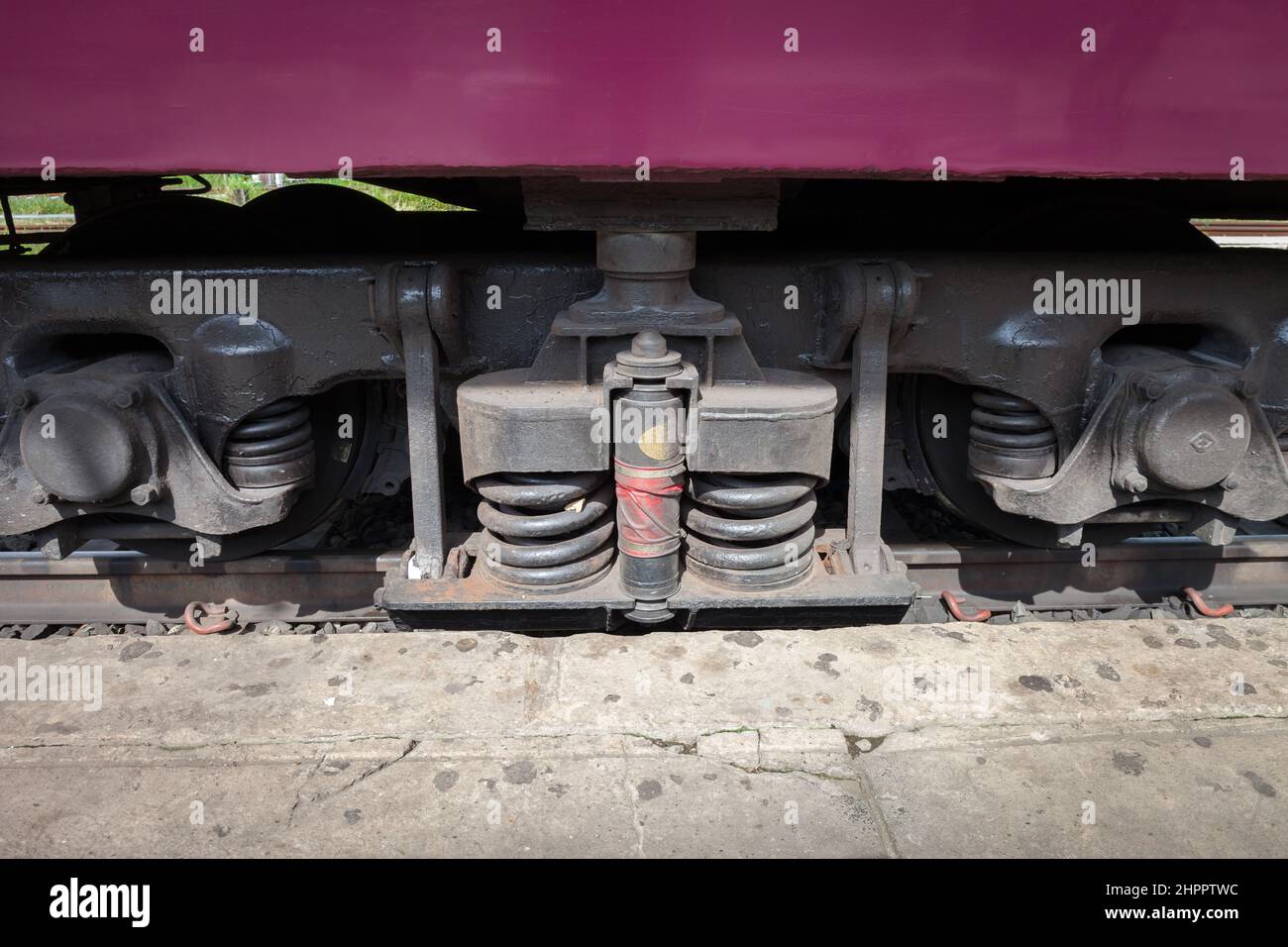 closeup wheel break and suspension system of diesel train Stock Photo ...