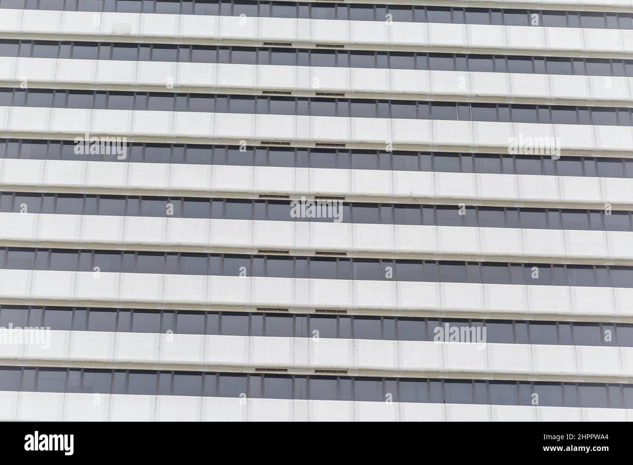 Windows of office building for background Stock Photo - Alamy