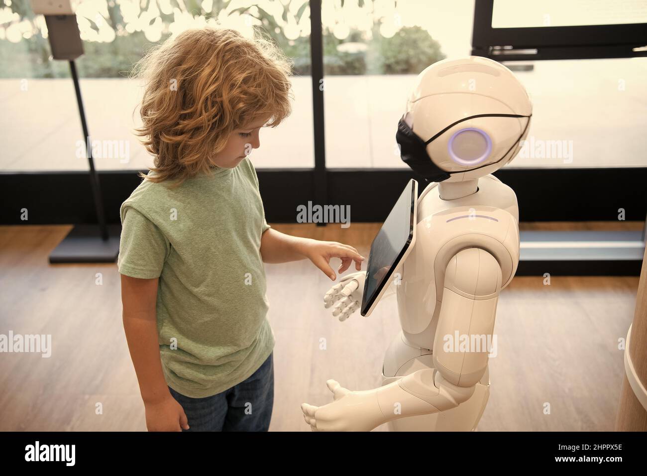 smart boy kid communicate with robot assistant technology for modern ...