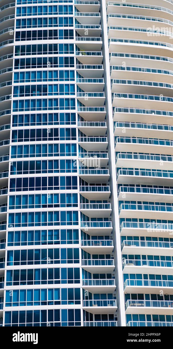 Architectural detail of high-rise apartment building facade with ...