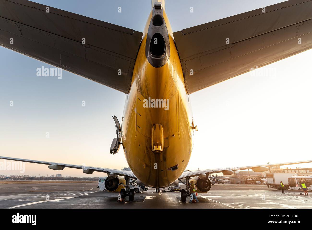 Scenic low angle pov rear bottom view of big modern passenger aircraft ...