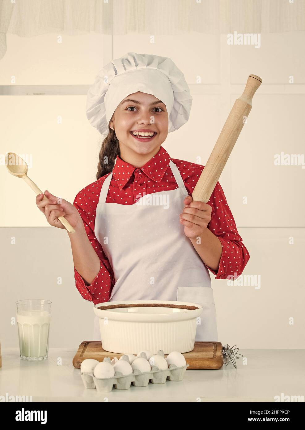 homemade pastry. happy childhood. happy teen girl cooking dough. kid in ...