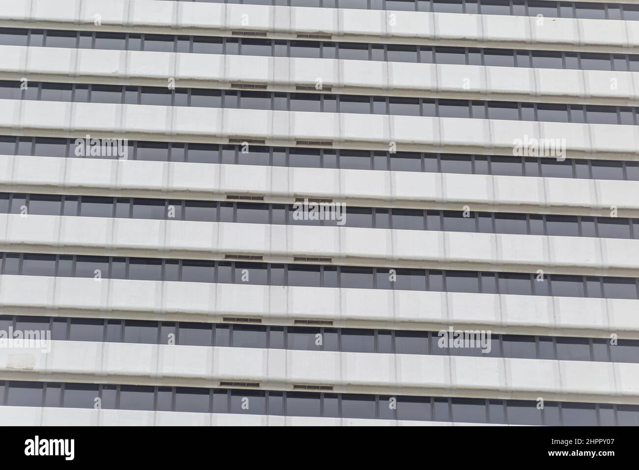 Windows of office building for background Stock Photo - Alamy