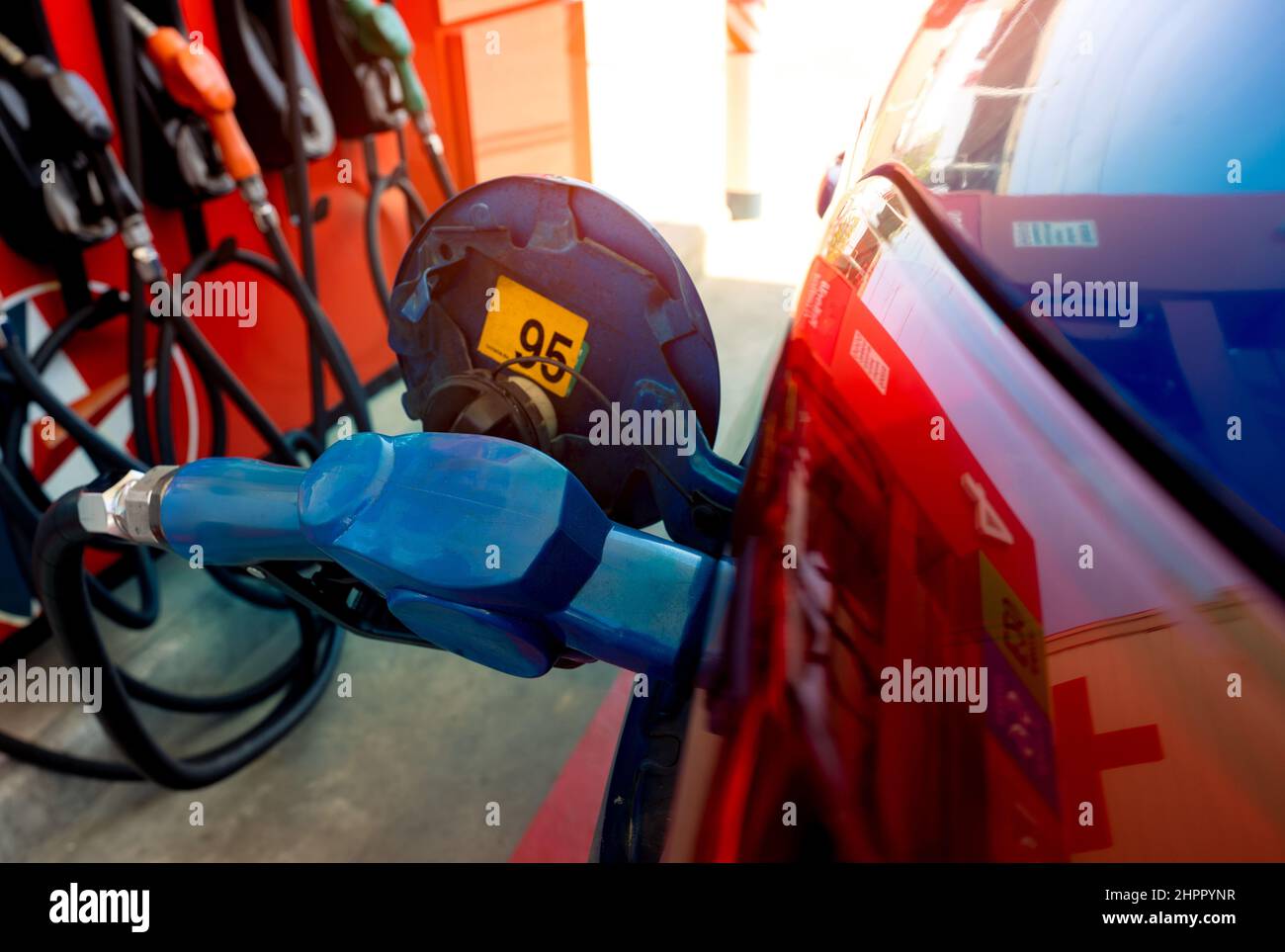 Car fueling at gas station. Refuel fill up with petrol gasoline. Petrol ...