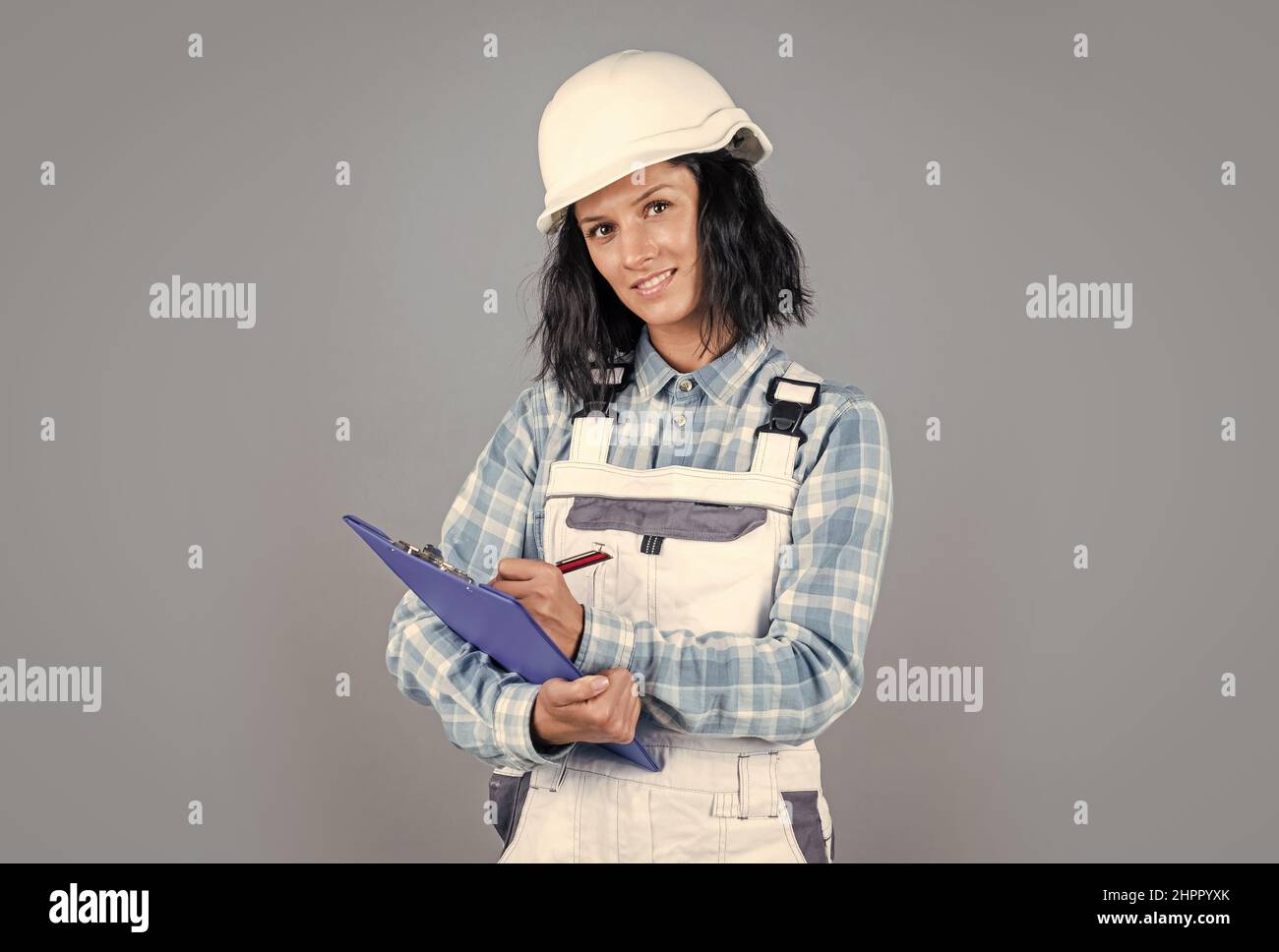 engineering education. female worker in working uniform. cheerful woman ...