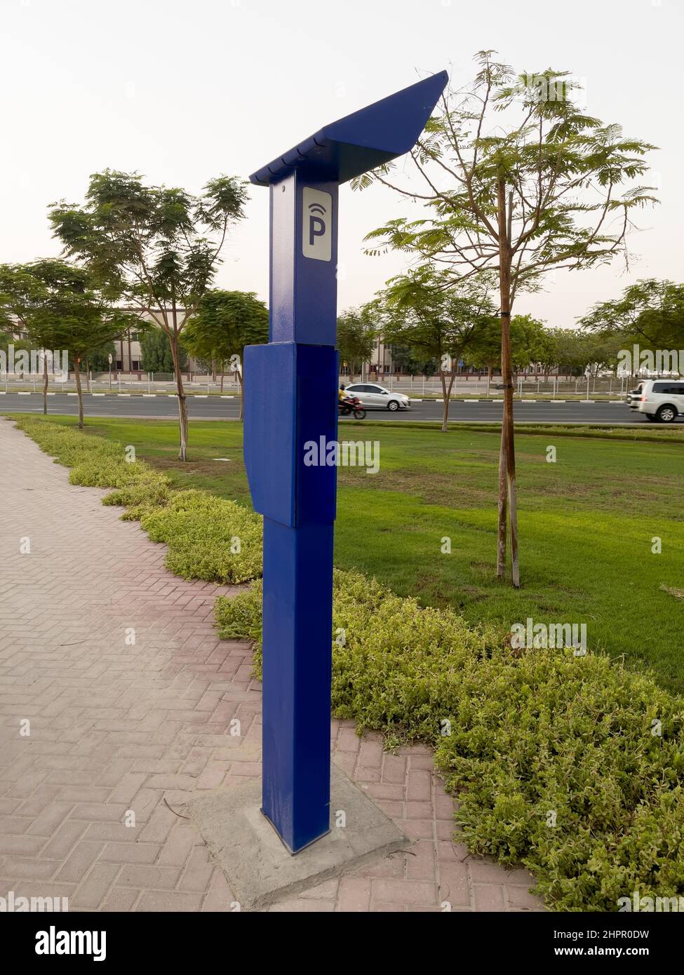 Modern solar powered smart Parking meter on the street Stock Photo - Alamy