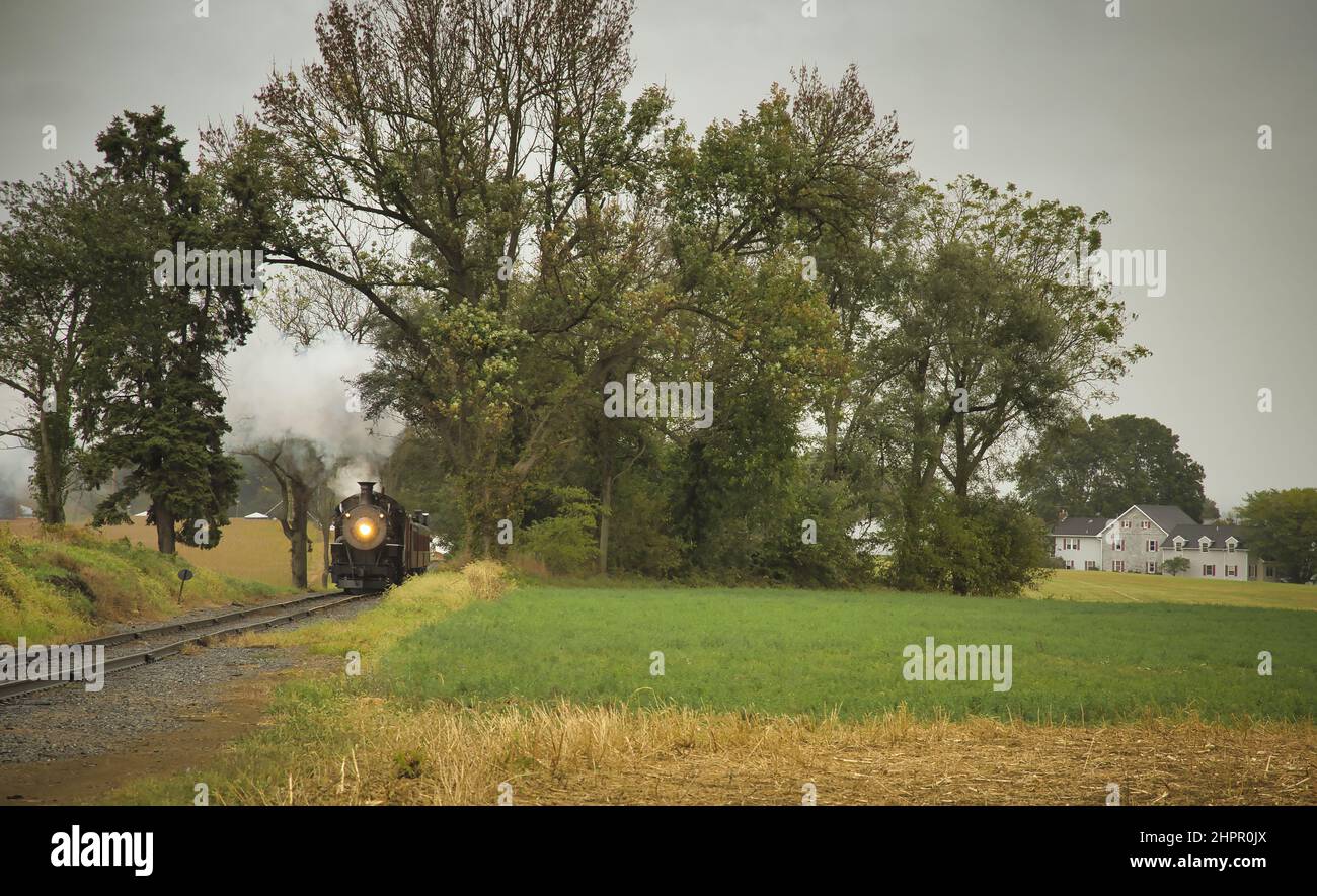 Antique restored Steam Freight train approaching Stock Photo - Alamy