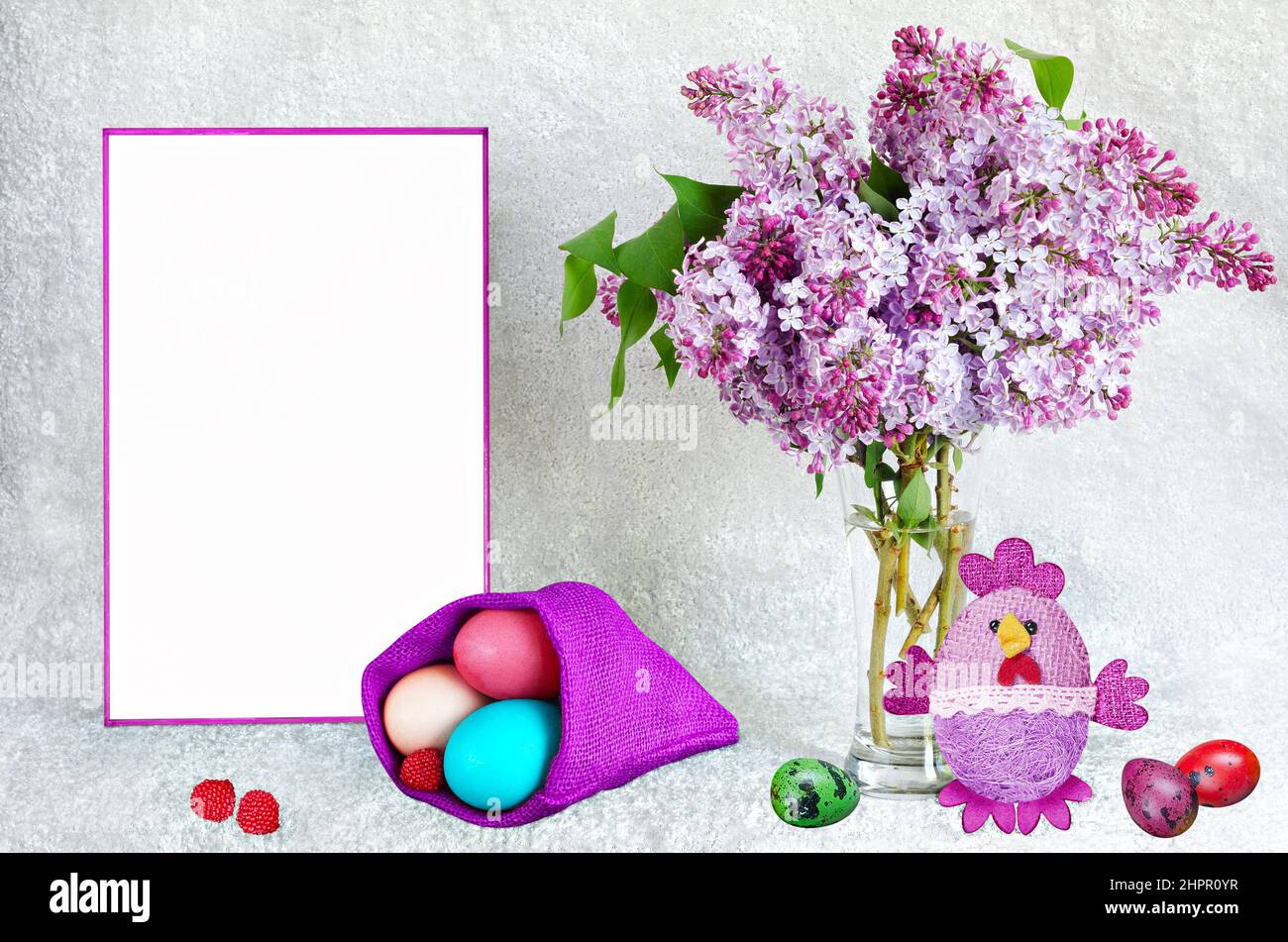 A text frame, Easter eggs, a symbolic chicken and a bouquet of lilacs ...