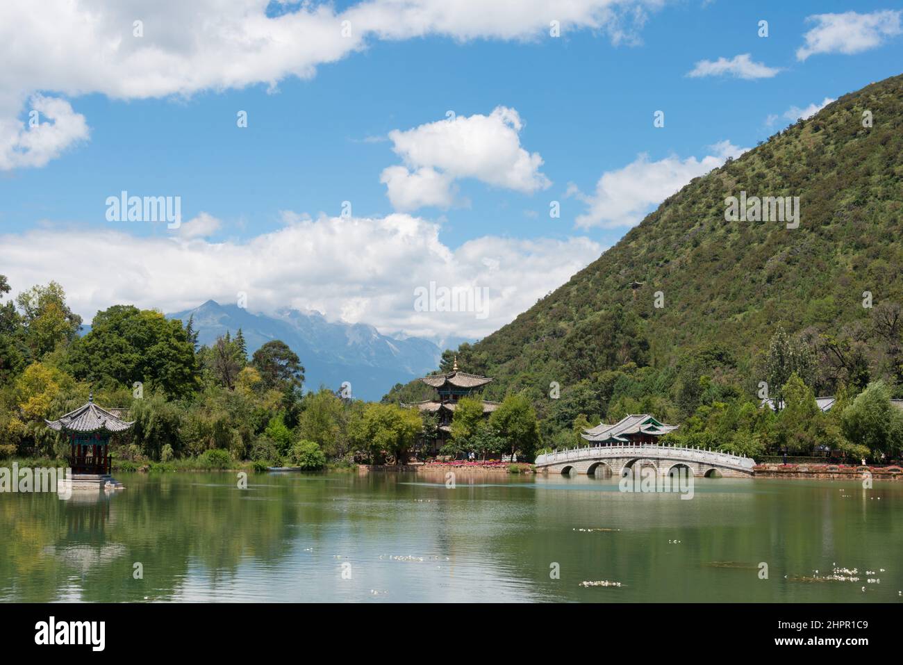 LIJIANG, CHINA - Black Dragon Pool at Old Town of Lijiang. a famous ...