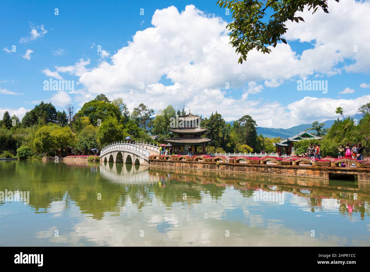 LIJIANG, CHINA - Black Dragon Pool at Old Town of Lijiang. a famous ...