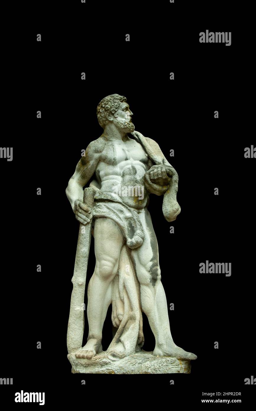 Ancient stone statue of Hercules against black background as symbol of ...