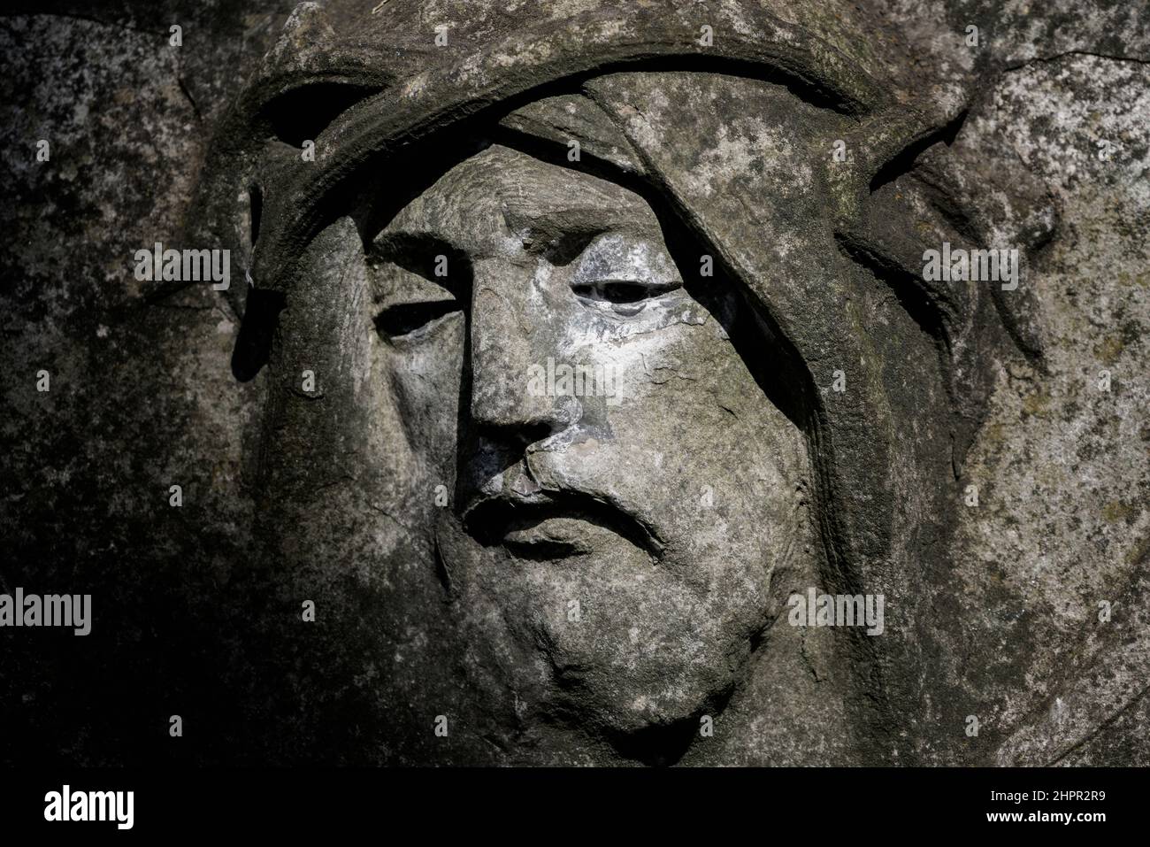 Destroyed ancient statue of Jesus Christ in a crown of thorns as symbol ...
