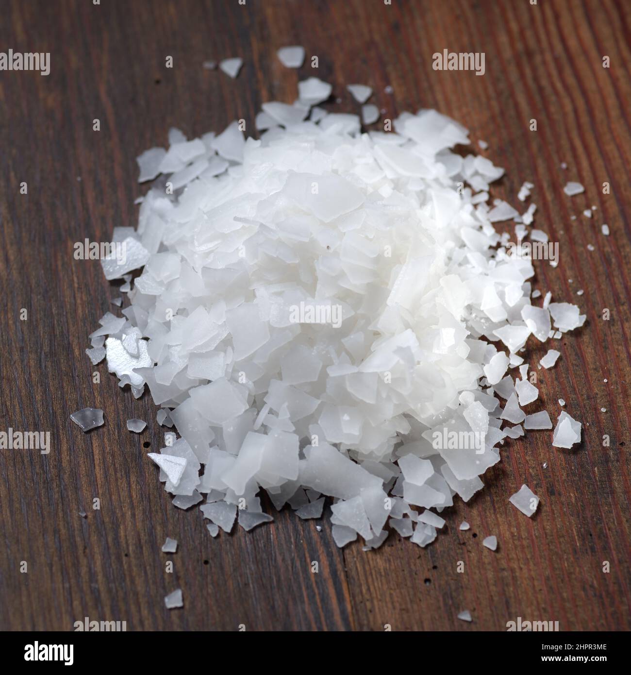 Different natural types of salt on a wooden background. Salt crystals ... Different natural types of salt on a wooden background. Salt crystals ...