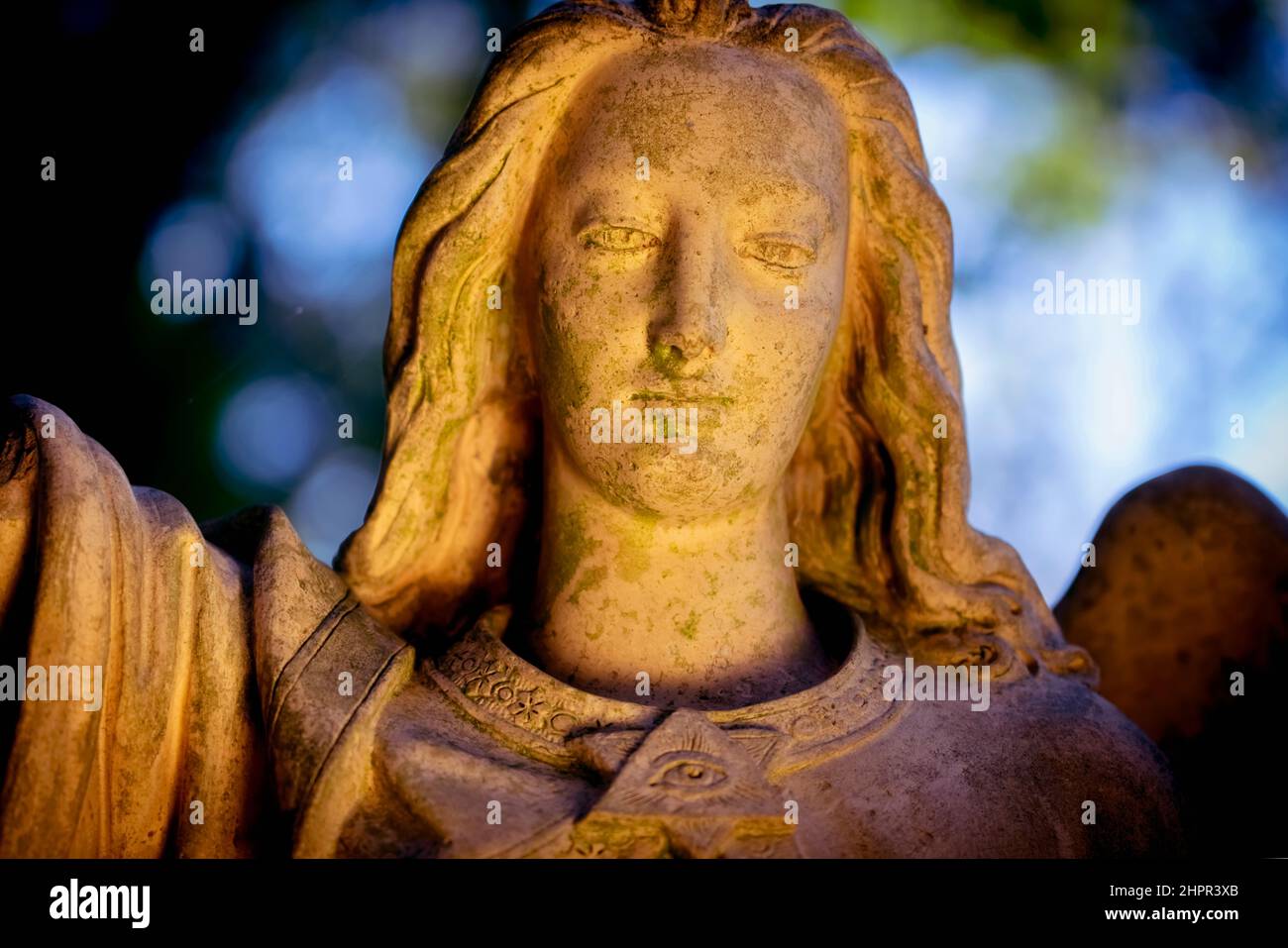 Beautiful angel. Fragment of an ancient stone statue. Horizontal image ...