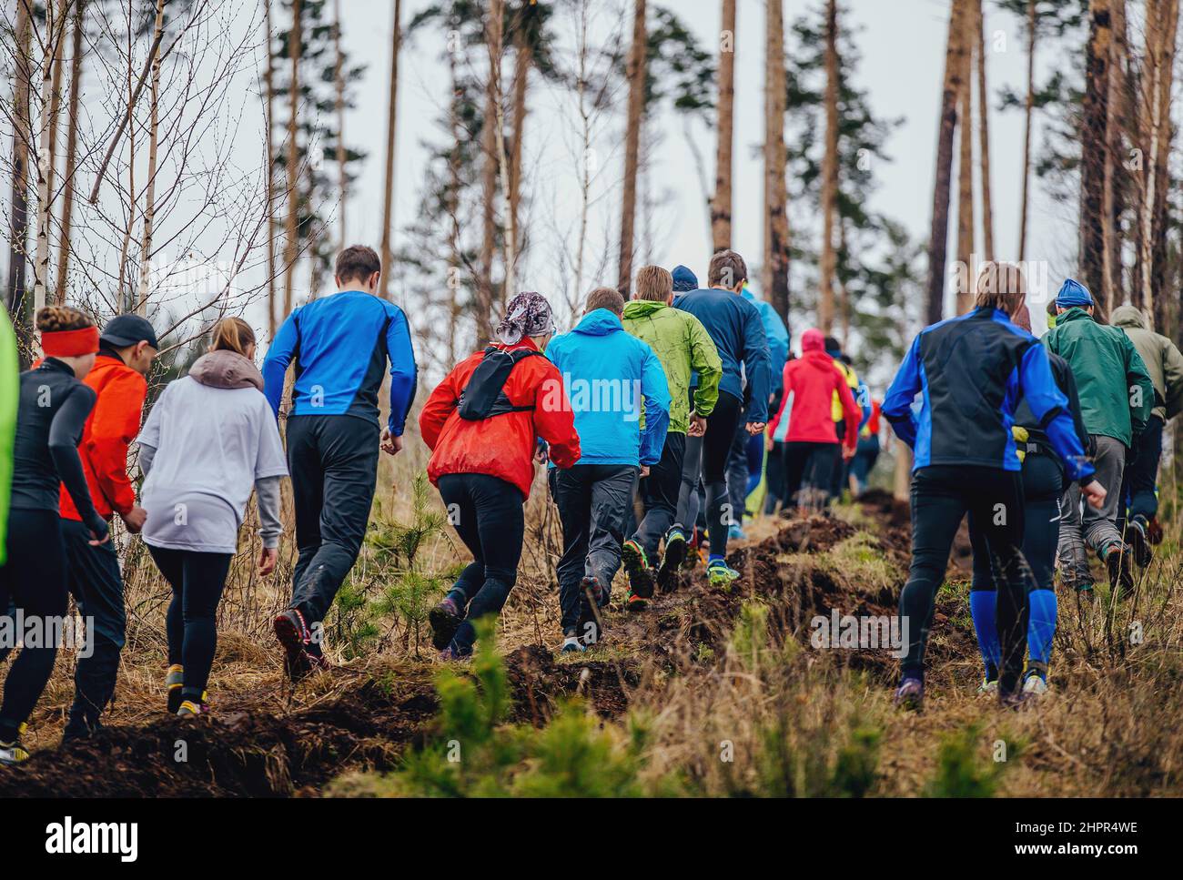 Group of people walking uphill hi-res stock photography and images - Alamy