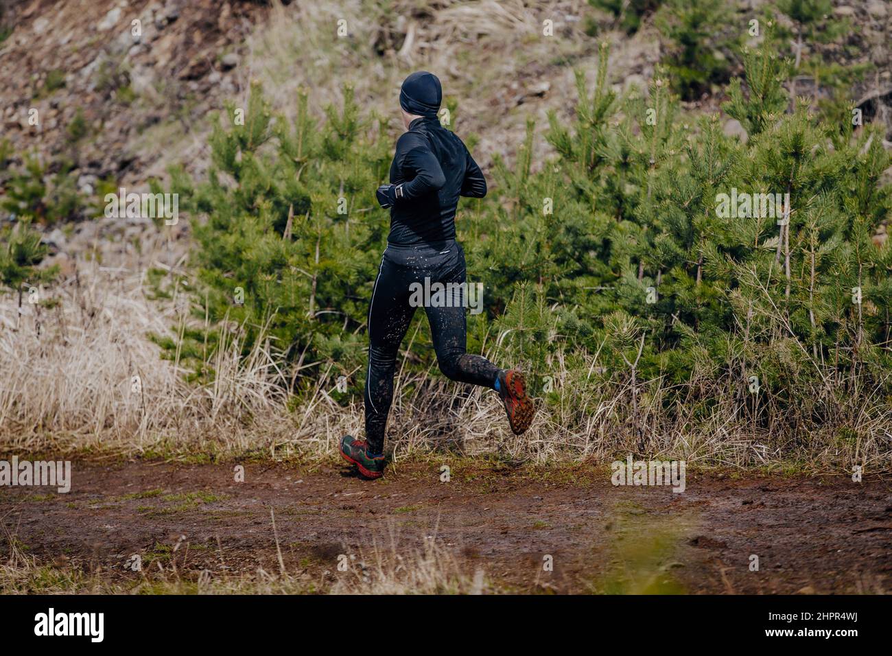 male runner run dirty trail spring marathon Stock Photo - Alamy