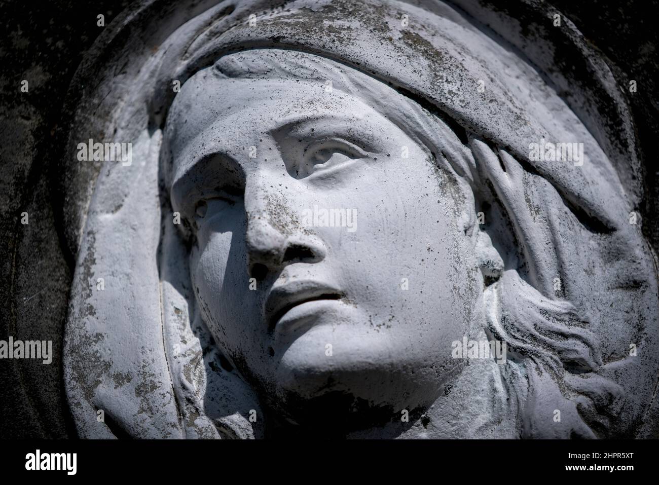 Virgin Mary ancient statue. Fragment of an ancient statue Stock Photo ...