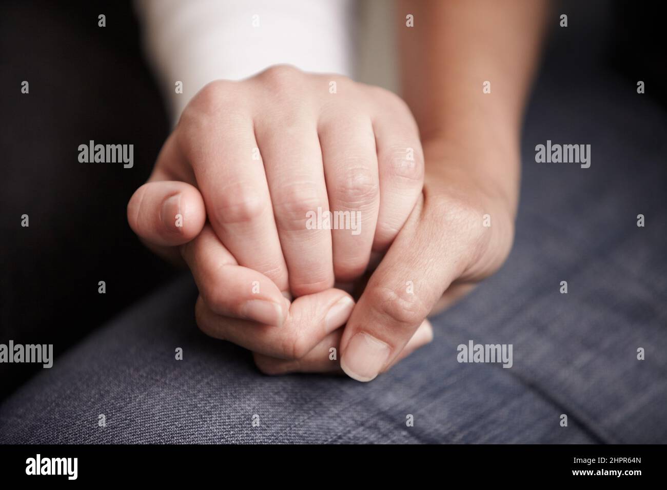 Rainbow touching hand hi-res stock photography and images - Alamy