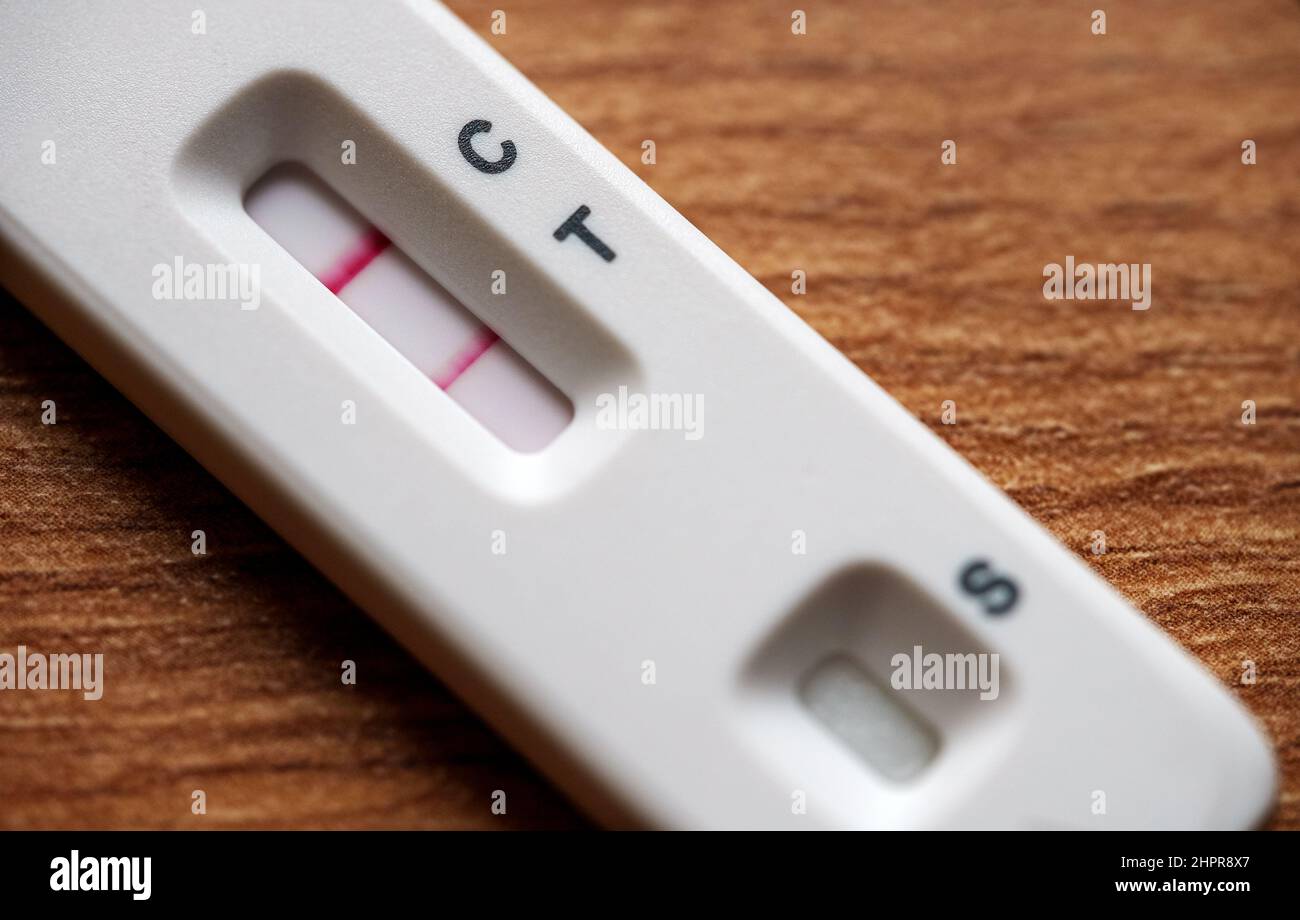 Positive Antigen Rapid Test for Coronavirus Stock Photo - Alamy
