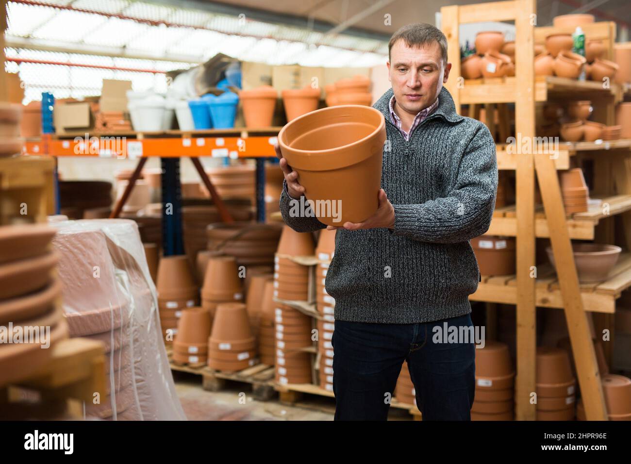 Plants salesperson hi-res stock photography and images - Alamy