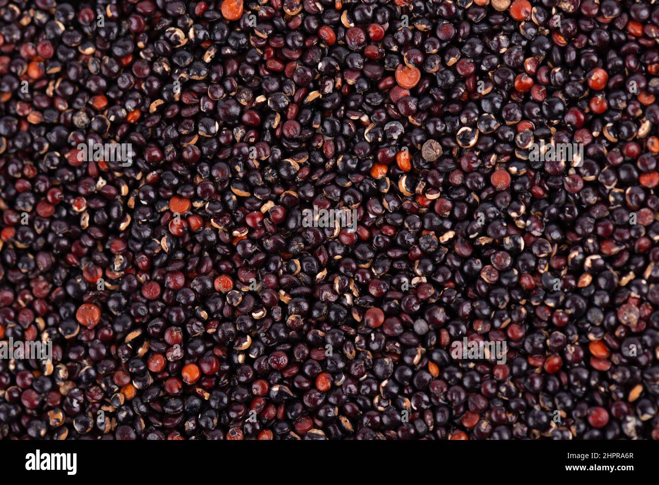 Black quinoa seeds background. Pile of raw kinwa. Top view Stock Photo ...