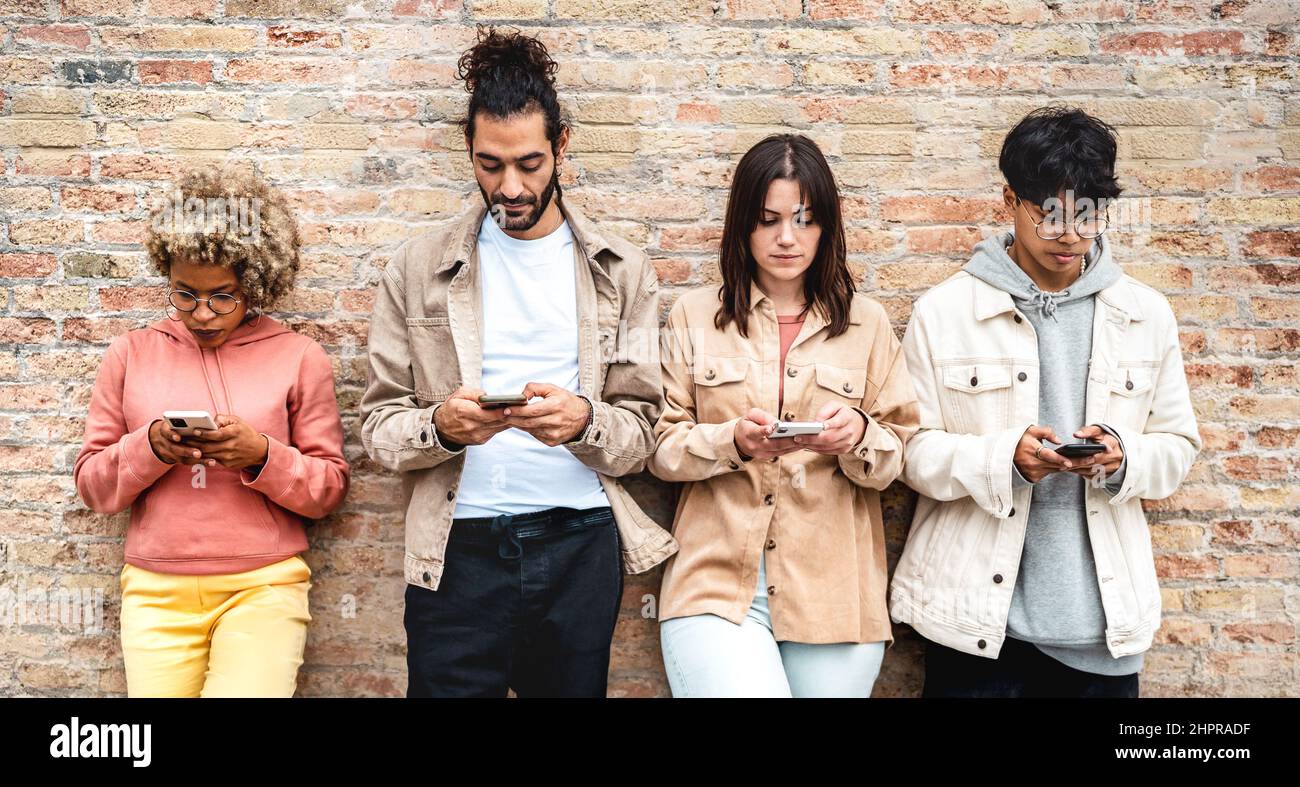 Multicultural students group using mobile smart phones at university ...