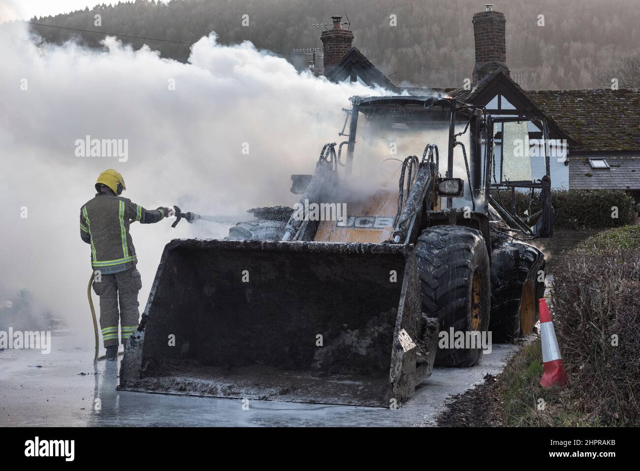 A fireman from the Hereford & Worcester Fire and Rescue Service using ...