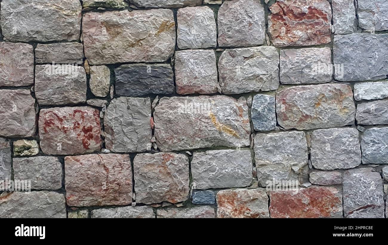 Stone wall. Front view, close up Stock Photo - Alamy