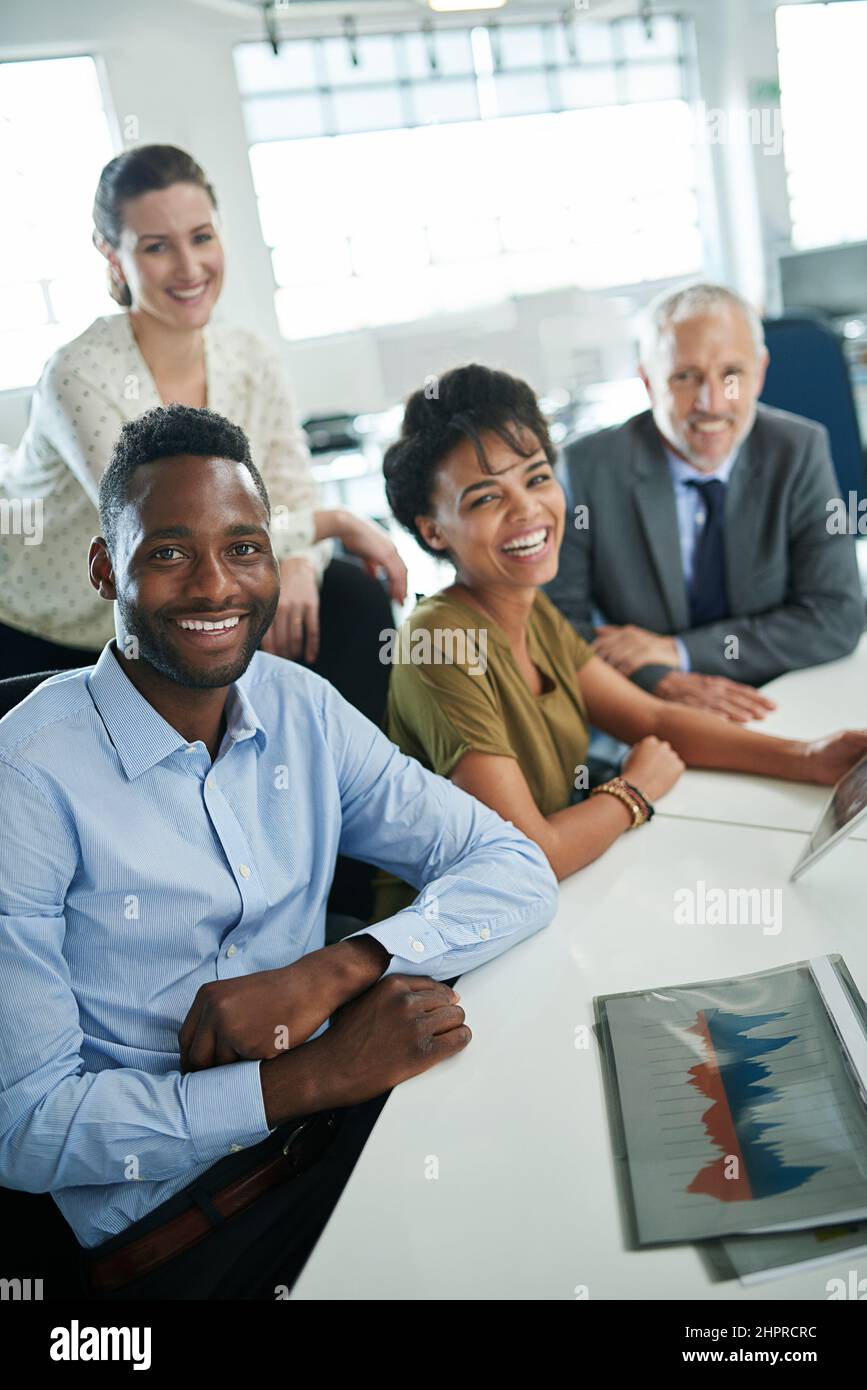 Its been a great day at the office. Portrait of a group of coworkers ...