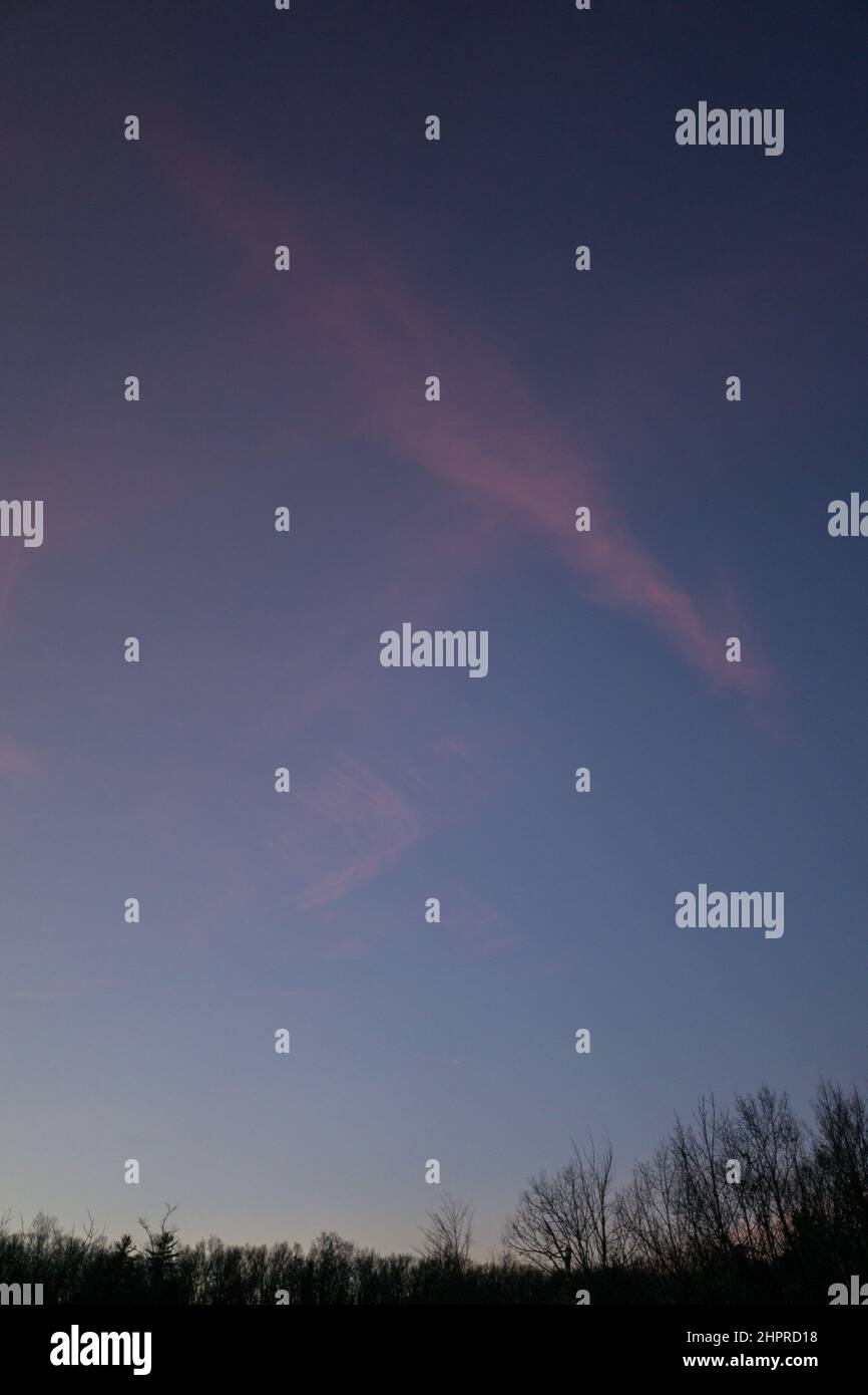 Lightly colored sunset clouds Stock Photo - Alamy