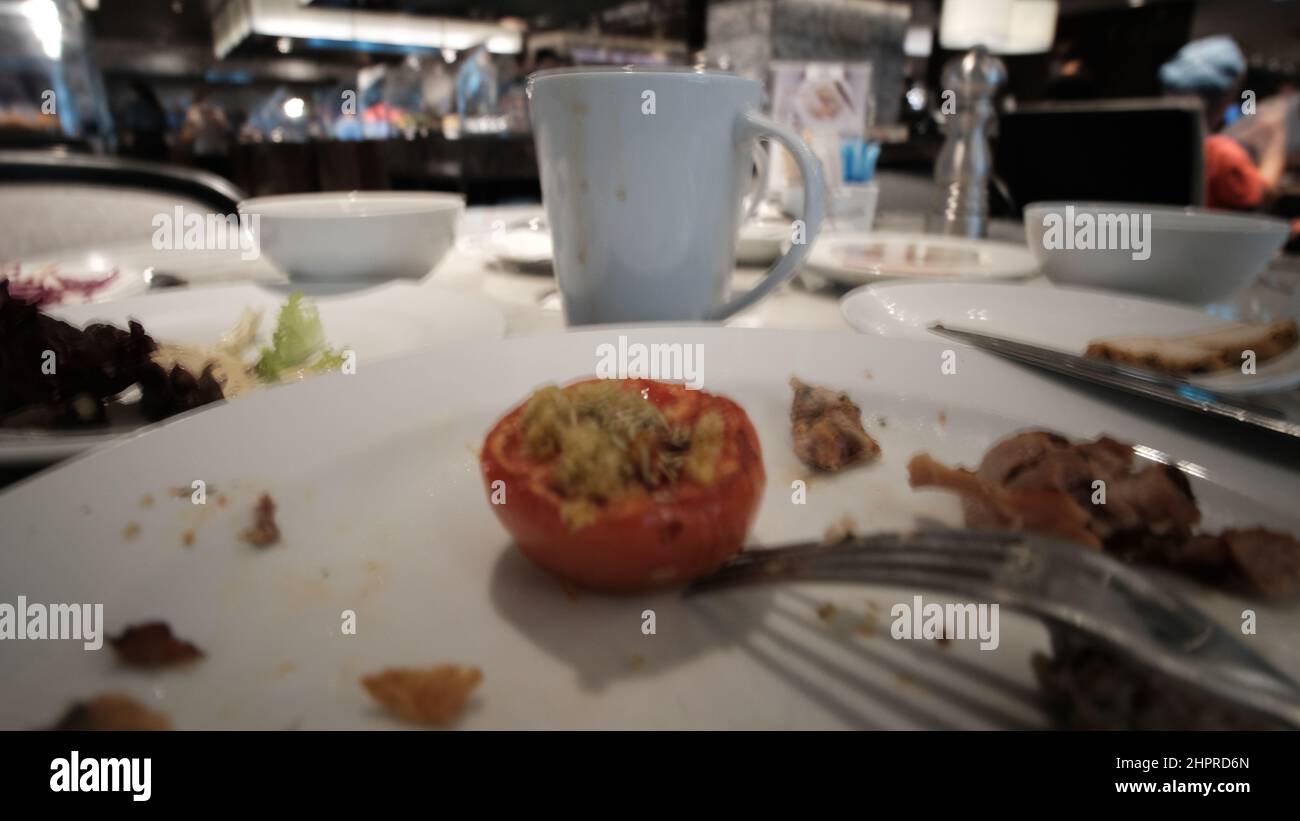 Tomato and Leftover Food from an ALL You Can Eat Lunch Buffet Stock ...
