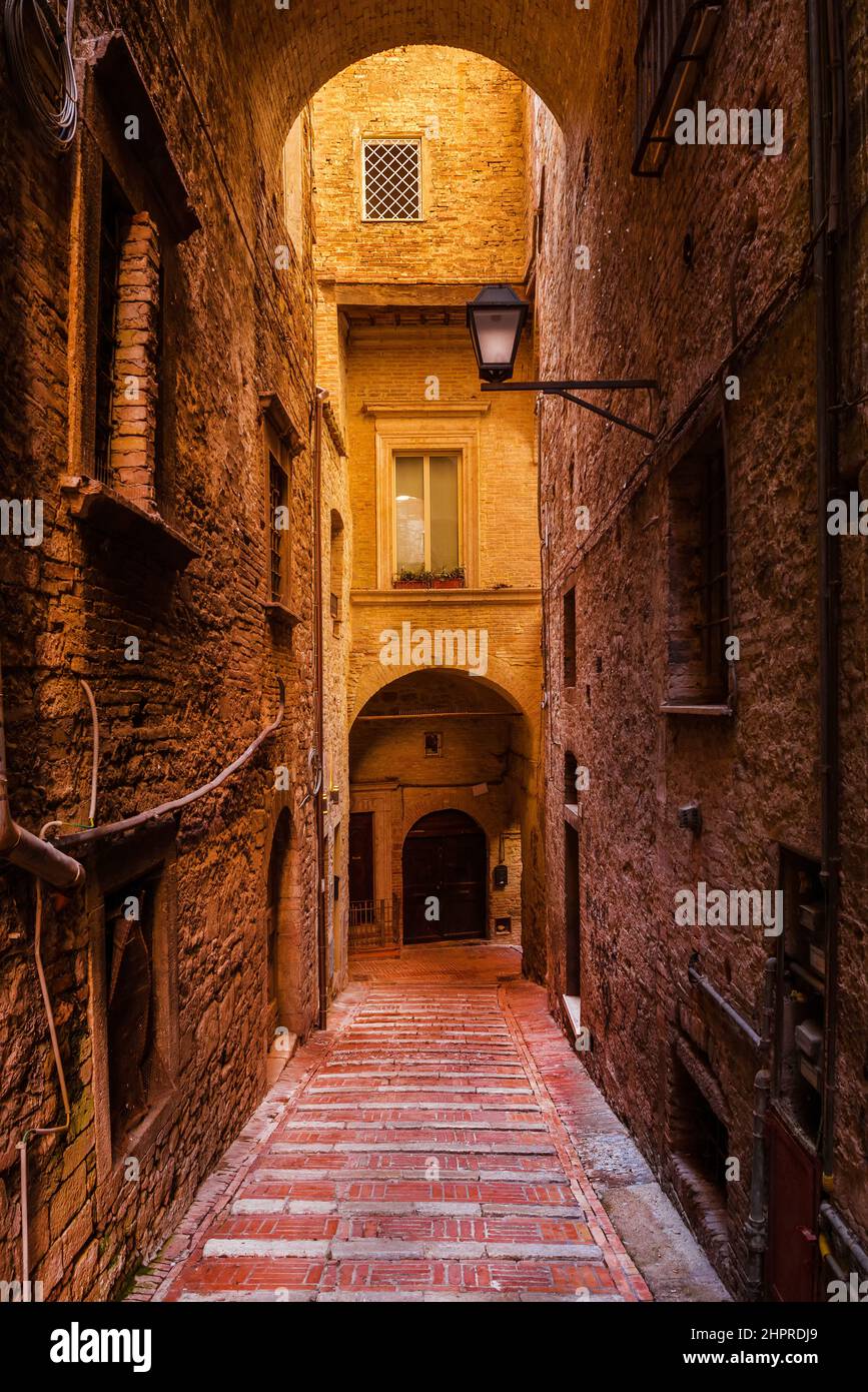Perugia historical center view with ancient arch Stock Photo - Alamy