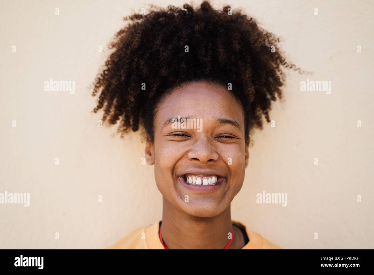 Happy african girl smiling on camera outdoor - Focus on face Stock ...