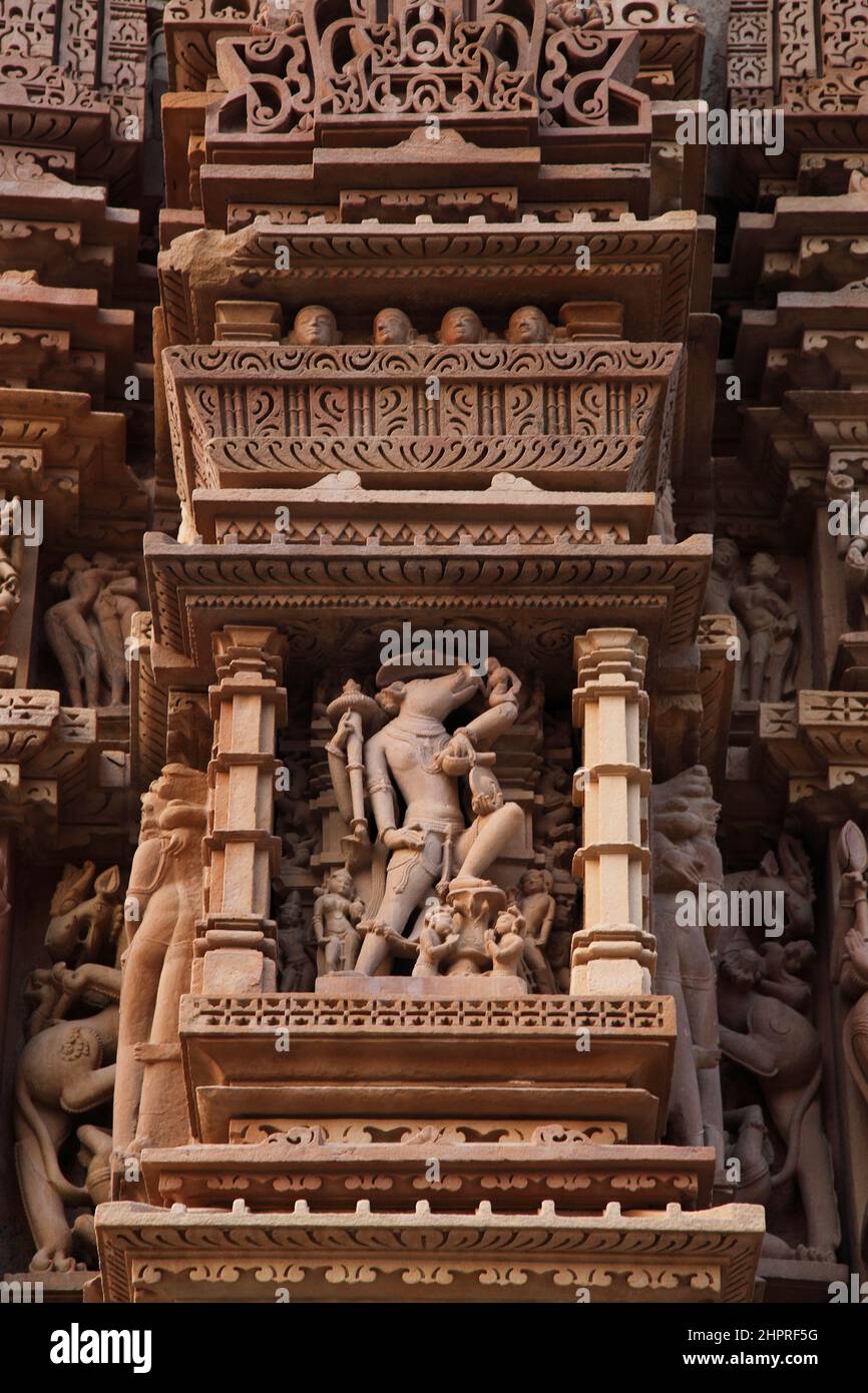 Carved stone figure on exterior of Kandariya Mahadev Temple, built by ...
