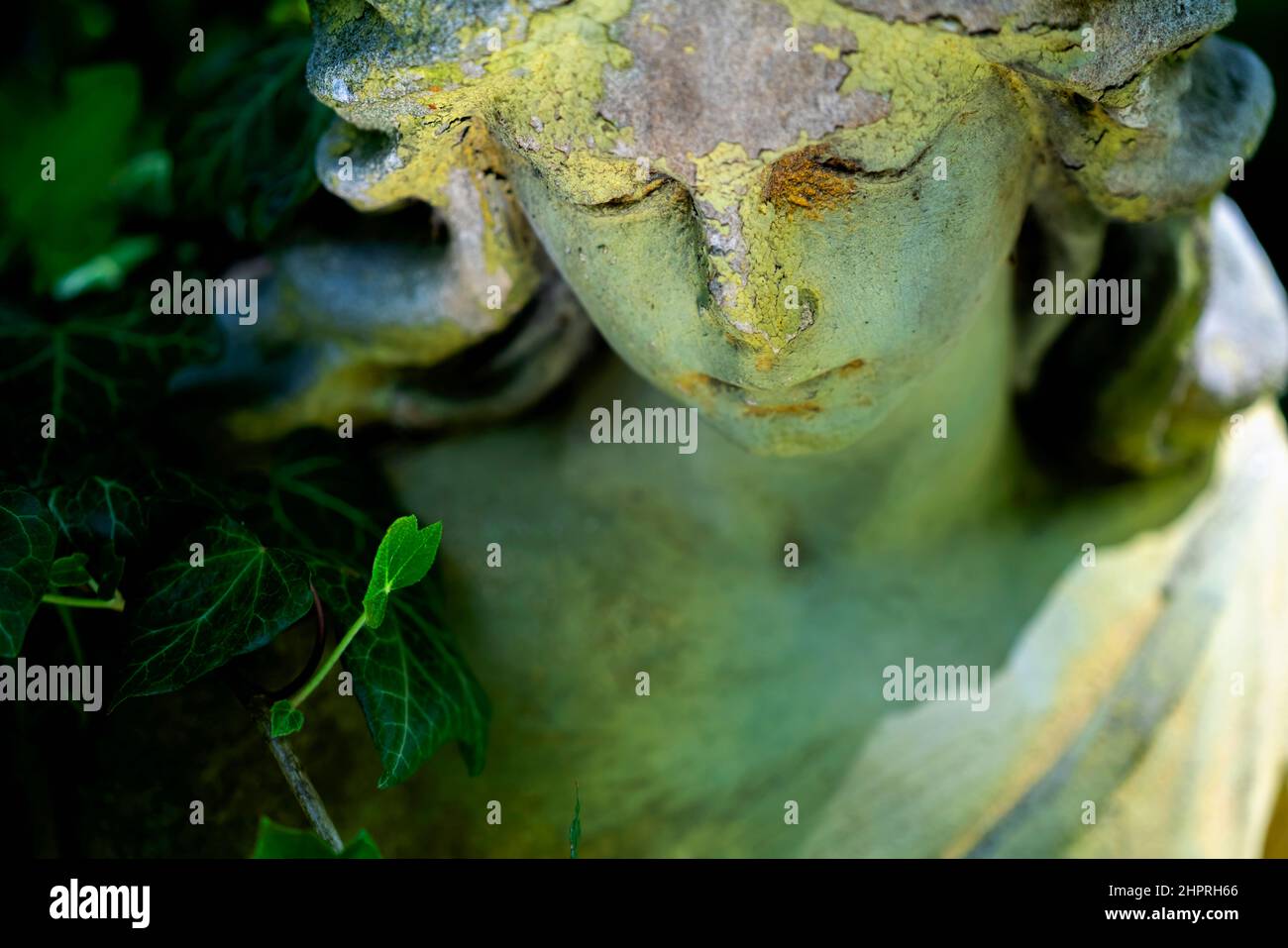 Beautiful angel with sweet facial expression. Fragment of an ancient ...