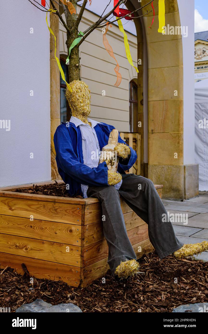 Straw figure in folk costume at carnival Stock Photo - Alamy