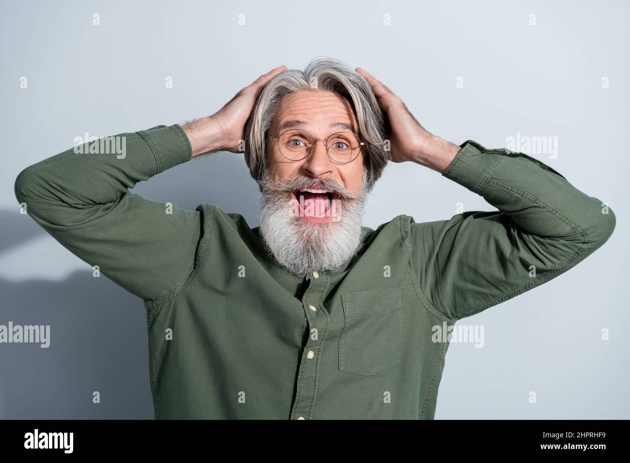 Portrait of attractive cheerful overjoyed crazy grey-haired man great ...