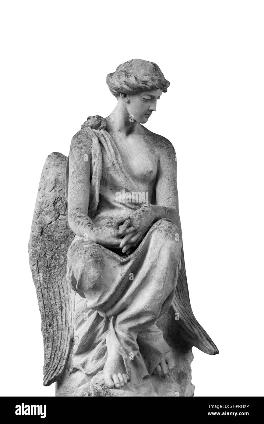 Beautiful angel with sweet facial expression. An ancient stone statue ...