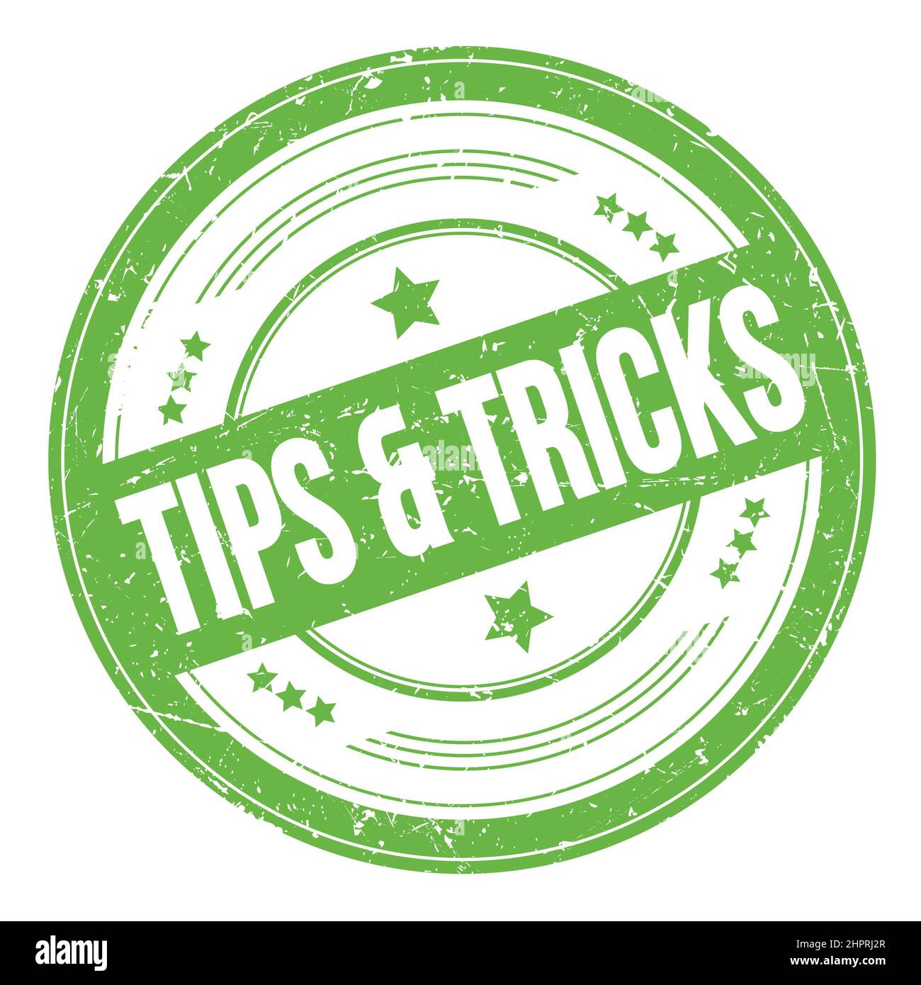 TIPS & TRICKS text on green round grungy texture stamp Stock Photo - Alamy