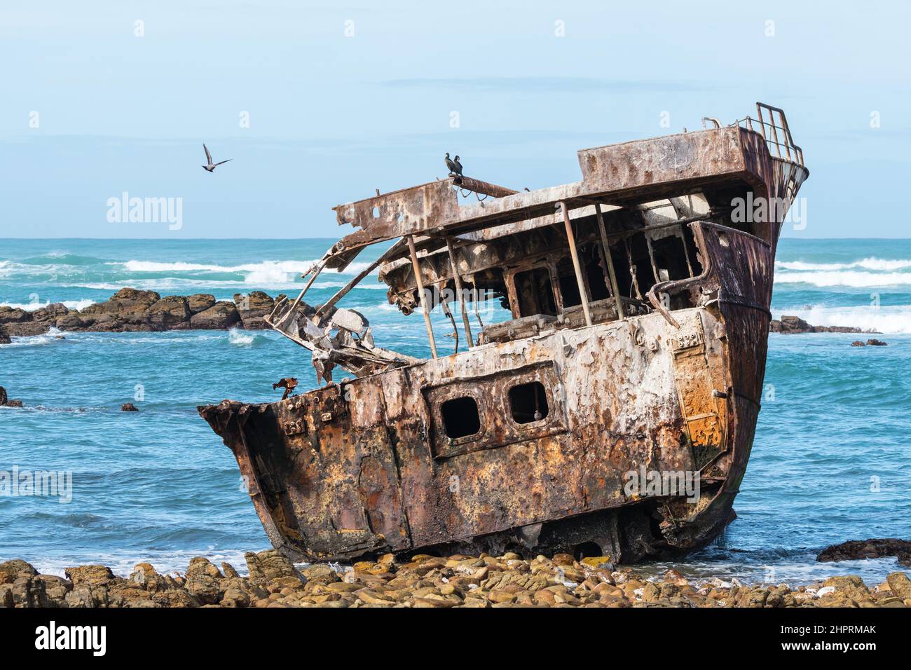 shipwreck Meisho Maru no.38 rusted and on the rocks at Cape Agulhas ...