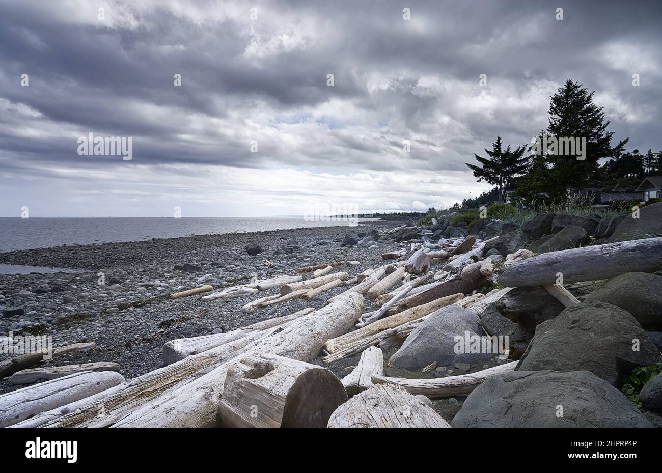 Coastal ocean beach on an overcast day Stock Photo - Alamy
