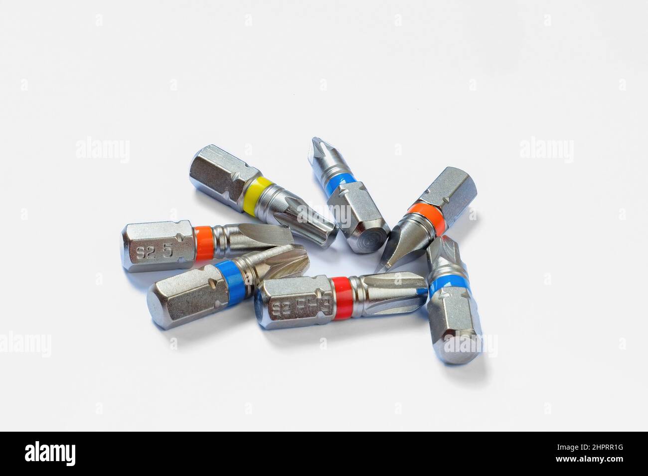 A set of bits for a screwdriver close-up white Stock Photo - Alamy